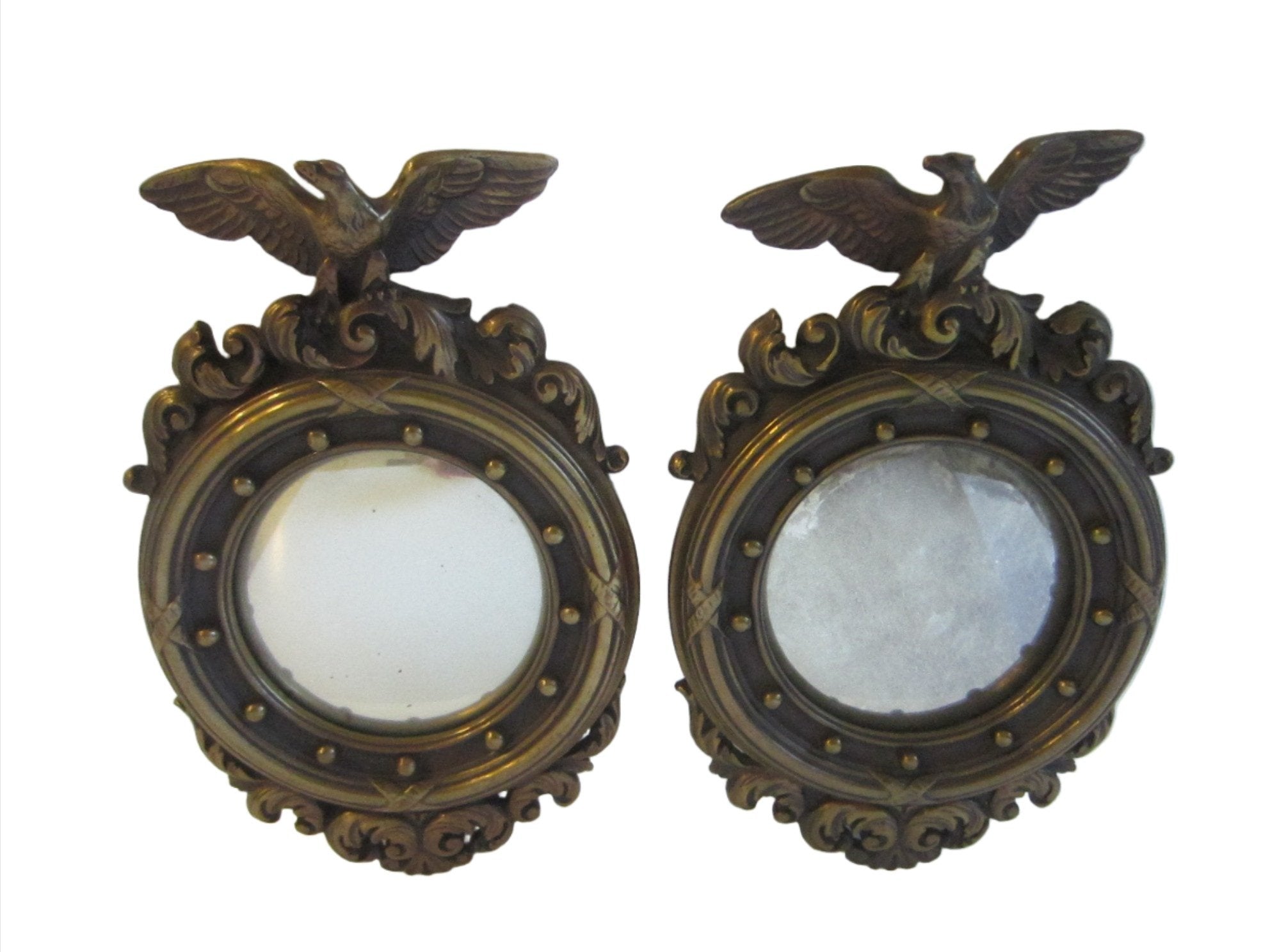 A Pair of Colonial Antiqued Eagle Crest Mid Century Convex Mirrors ...
